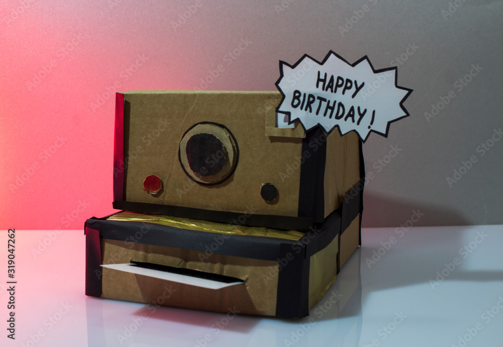 Sign "Happy Birthday" on made instant camera made of cardboard Stock ...