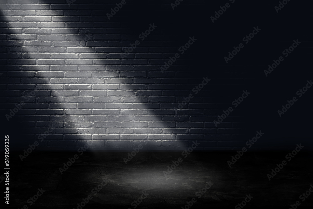Studio dark room black brick wall and spotlight. Stock Photo | Adobe Stock