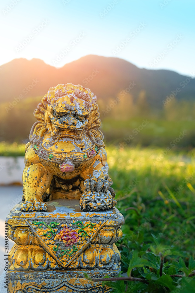 Chinese stone lion statue on nature background. Asian lion - symbol of ...