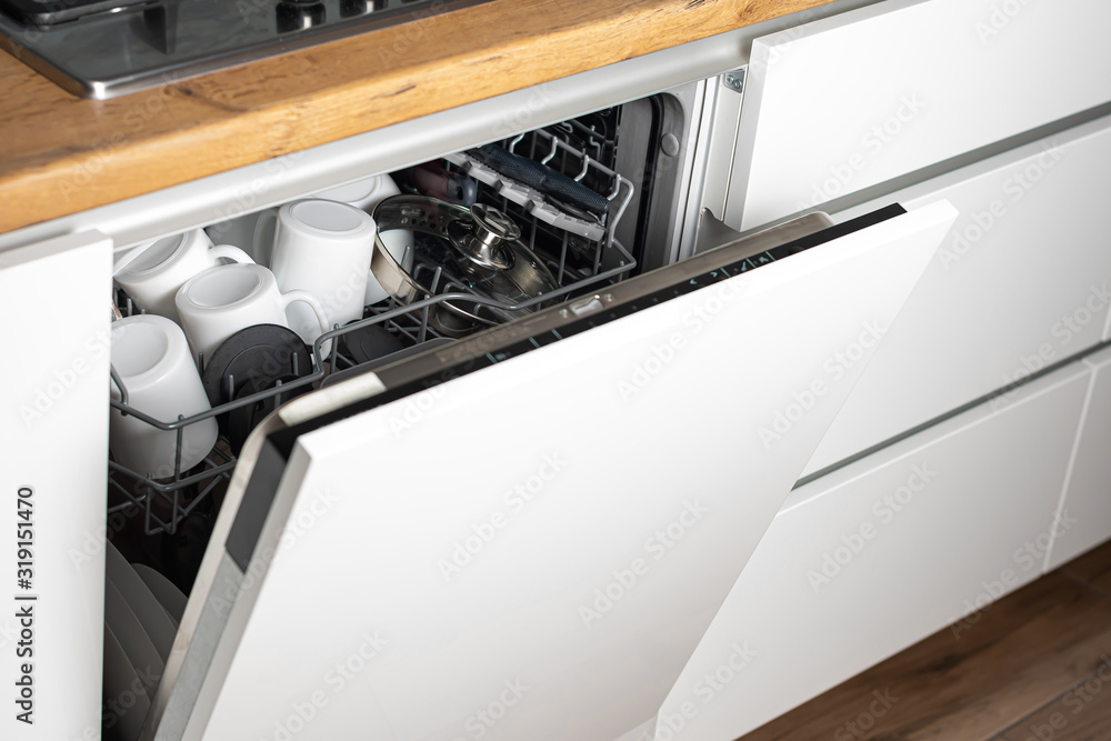 Dishwasher integrated in a modern kitchen Stock Photo | Adobe Stock