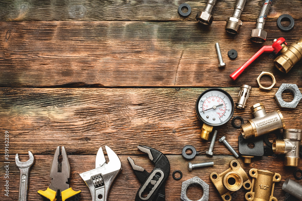 Plumbing flat lay background with copy space. Work tools and pipeline ...