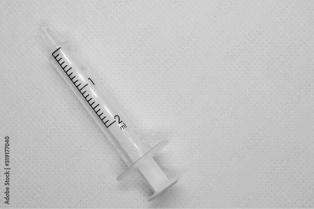 Empty, plastic medical syringe, a simple reciprocating pump, medical ...