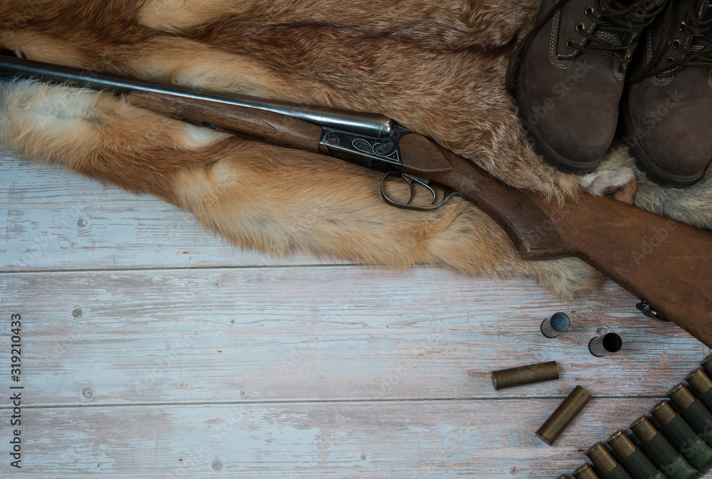 Hunting equipment. The border is made of hunting weapons, bandolier ...