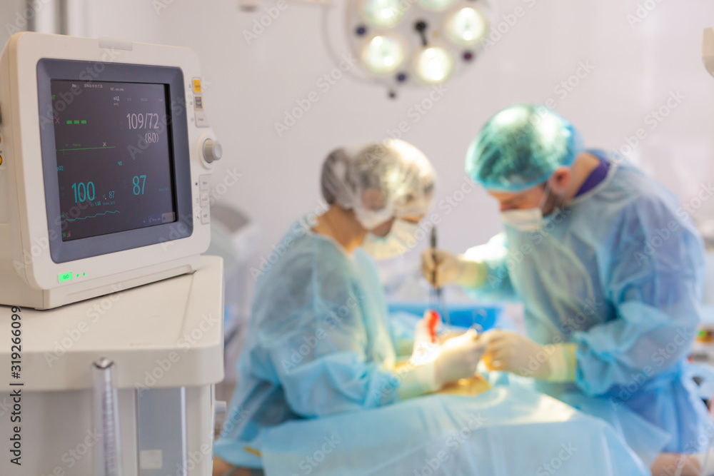 Hospital. Surgeon operates in the operating room. Monitoring of vital ...