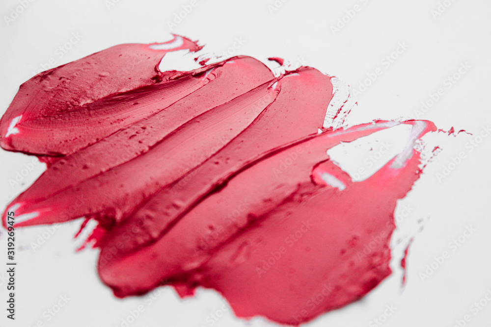 Lipstick smear smudge swatch isolated on white background. Cream makeup ...