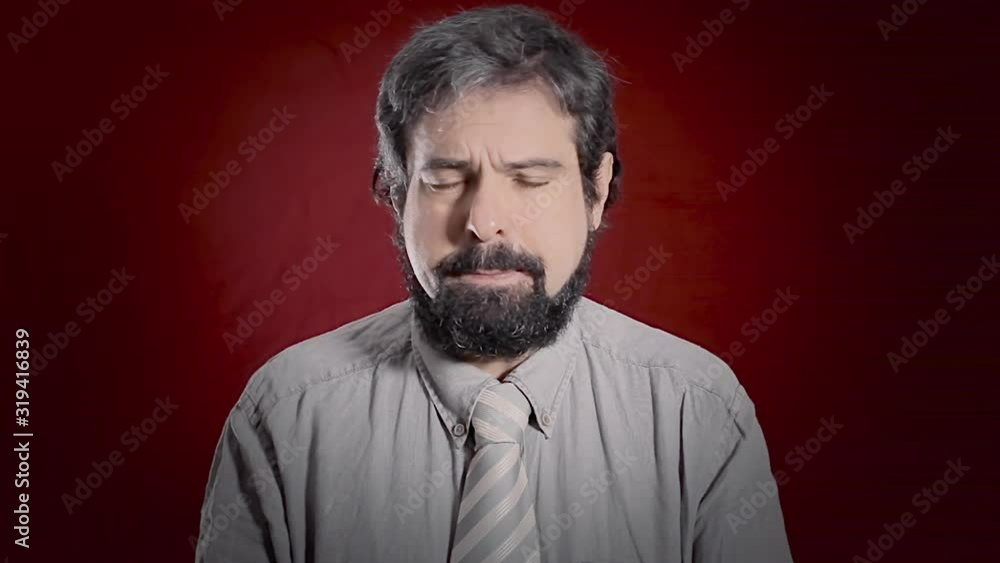 Video Stock An ashamed man's expression. Medium close-up shot of the ...
