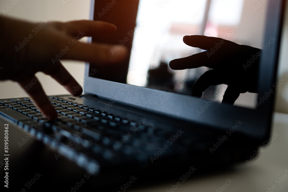 Cyber crime hand reaching out through laptop computer, attack ...
