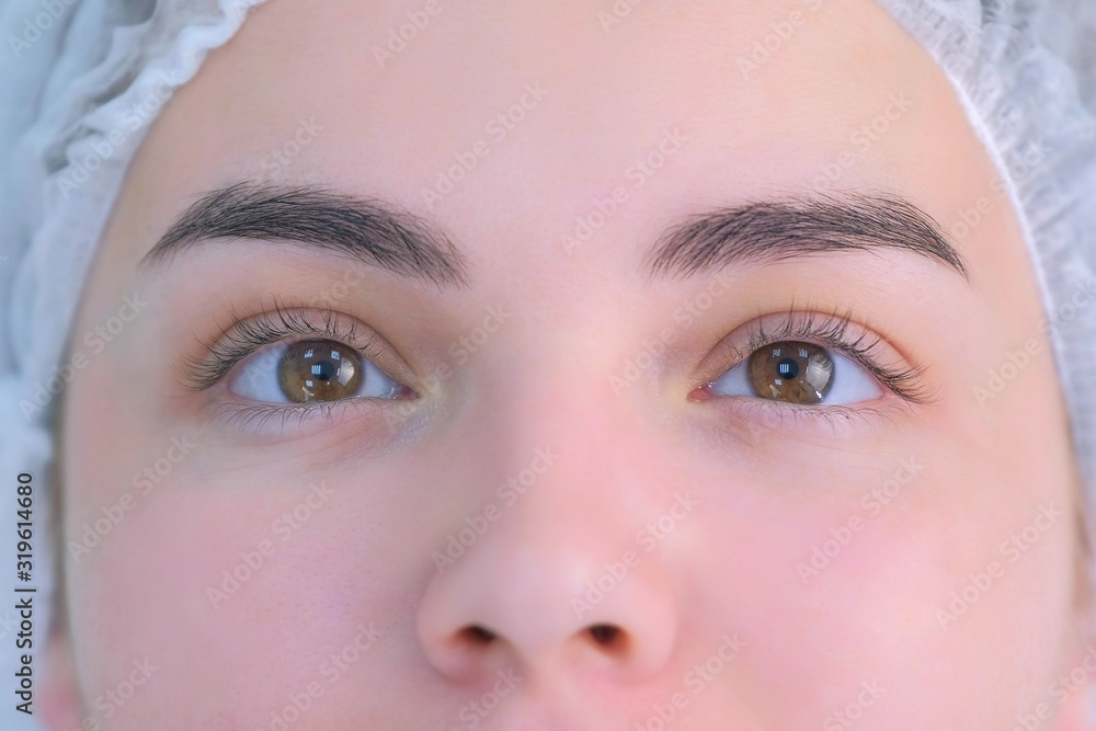 Woman's lashes before beauty procedure of eyelash lifting and ...
