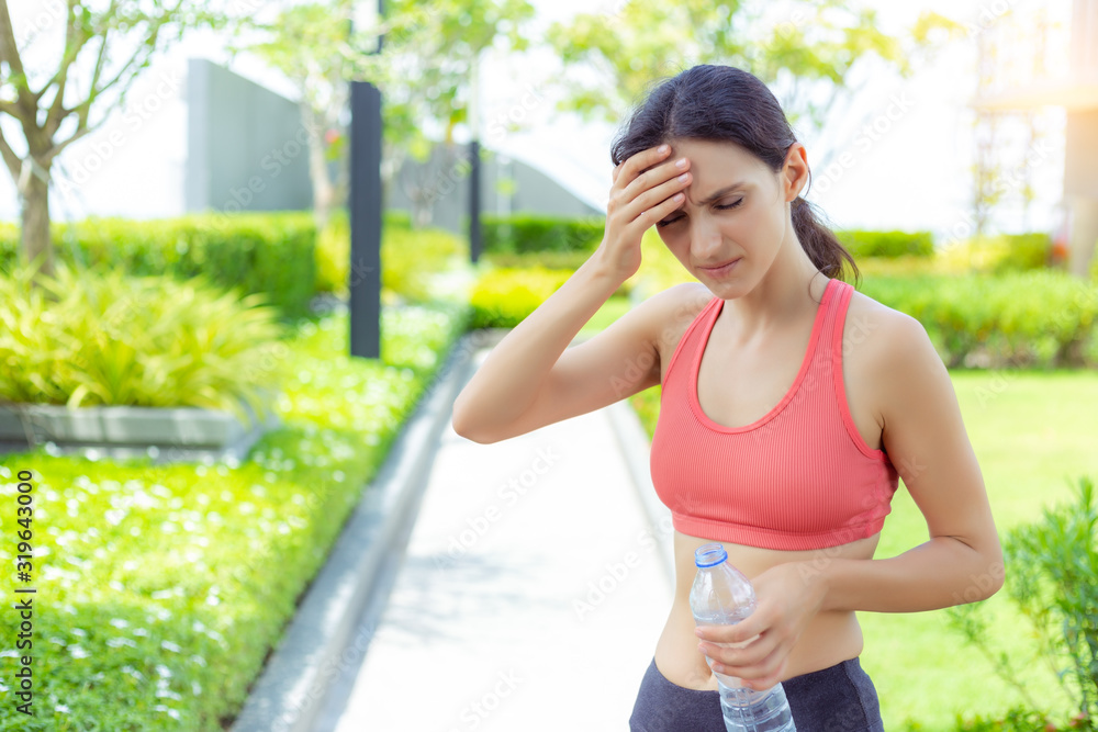 Heatstroke concept. Young woman gets heatstroke, faints when she works ...