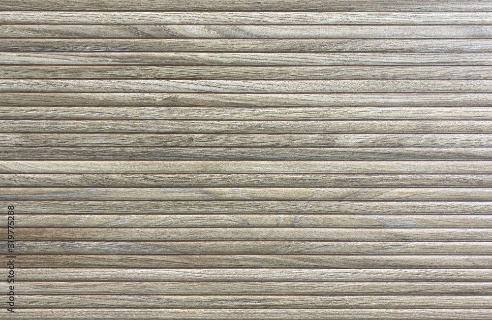 Detail of a ceramic tile wall with strips of wood texture. Background ...
