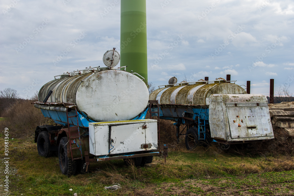 rusty and decaying milk tank trailers as they were used in the German ...