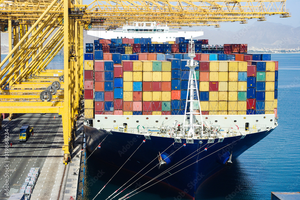 Ultra large container carrier ship in the port Khorfakkan has loading ...