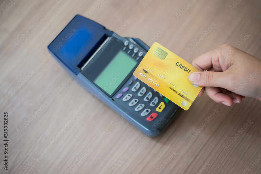 Customer hand, pay bill Hold contactless credit cards with NFC. Communication. Payment concepts ...