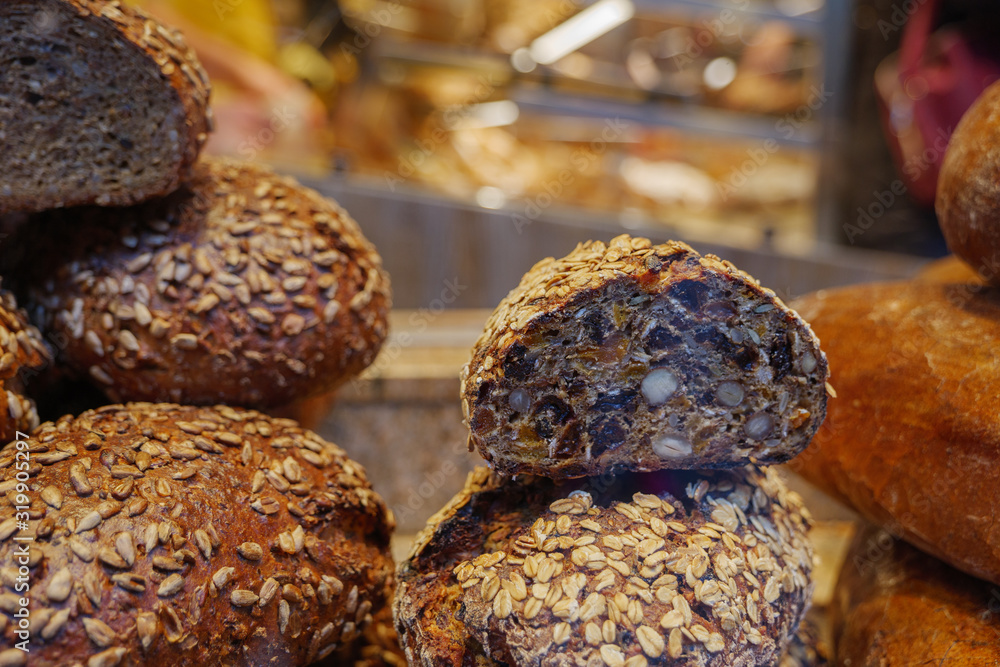 Heap and stack of round rye and wheat mix with various cereal and ...