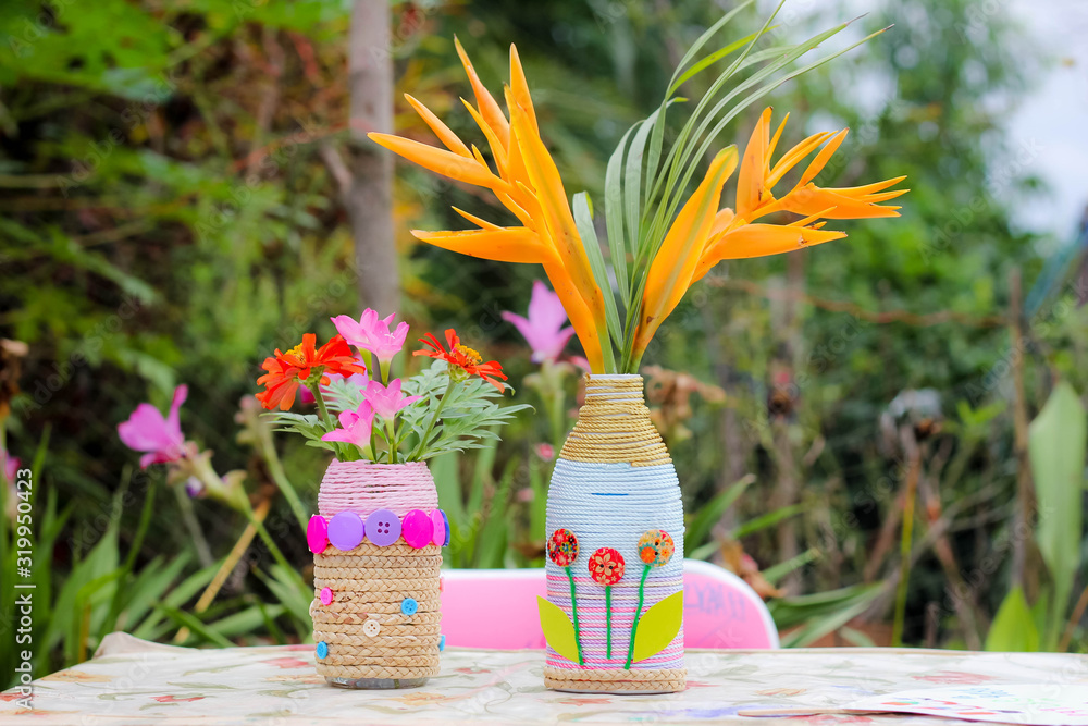 A 6 year old Asian Child Doing Crafts D I Y Flower Vases From Waste A 6 year old Asian Child Doing Crafts D I Y Flower Vases From Waste