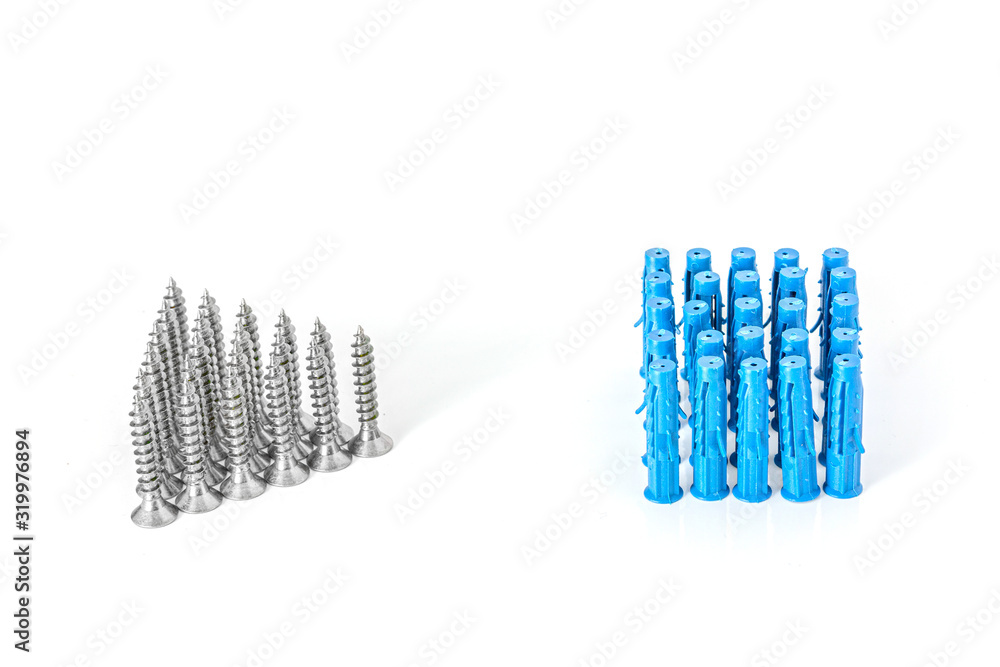 Metal screws are arranged in a triangle and plastic dowels built in a ...