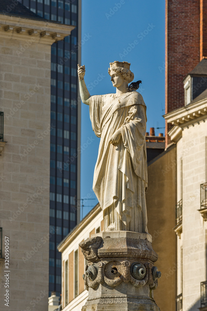 The city of Nantes is represented by a white marble statue with the ...