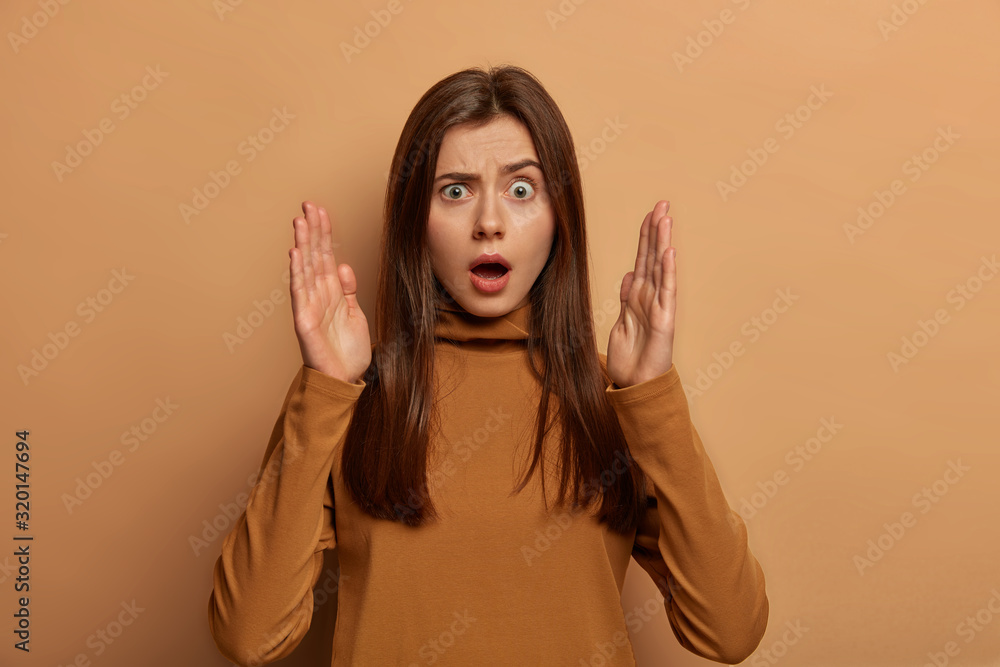 Portrait of surprised Caucasian woman impressed by big size, shapes ...