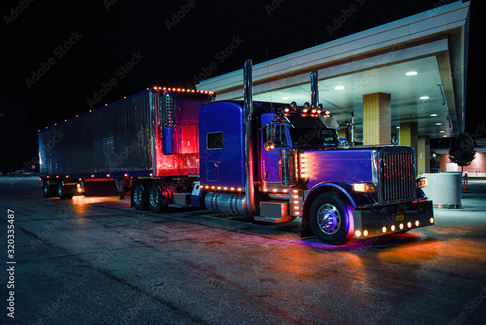 Night rider semi truck stand on parking Stock Photo | Adobe Stock