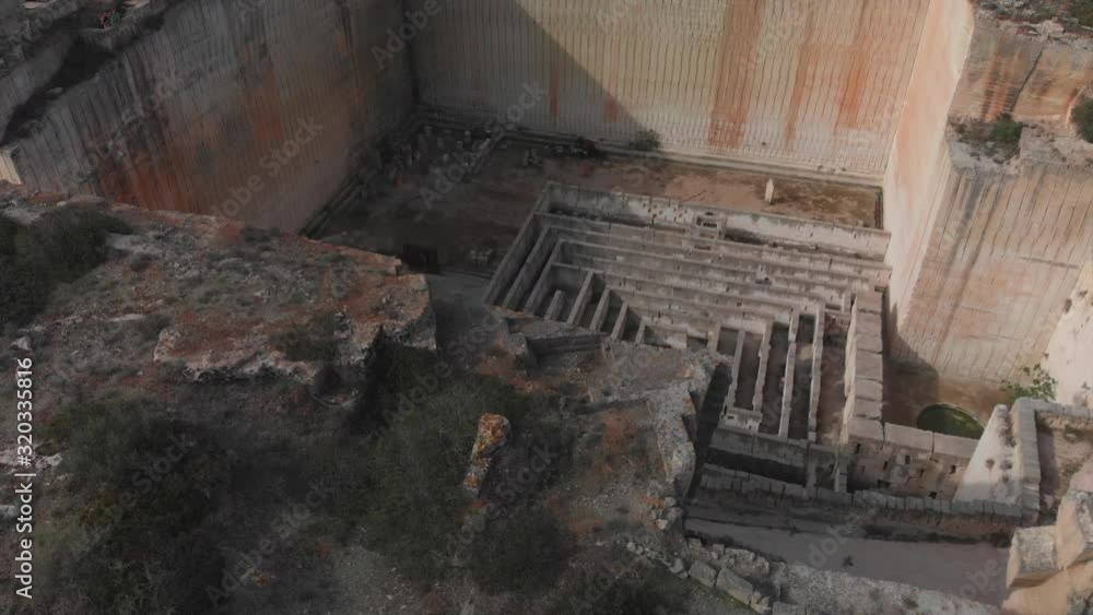 drone footage of Lithica Ciutadella in menorca spain tilting down the ...