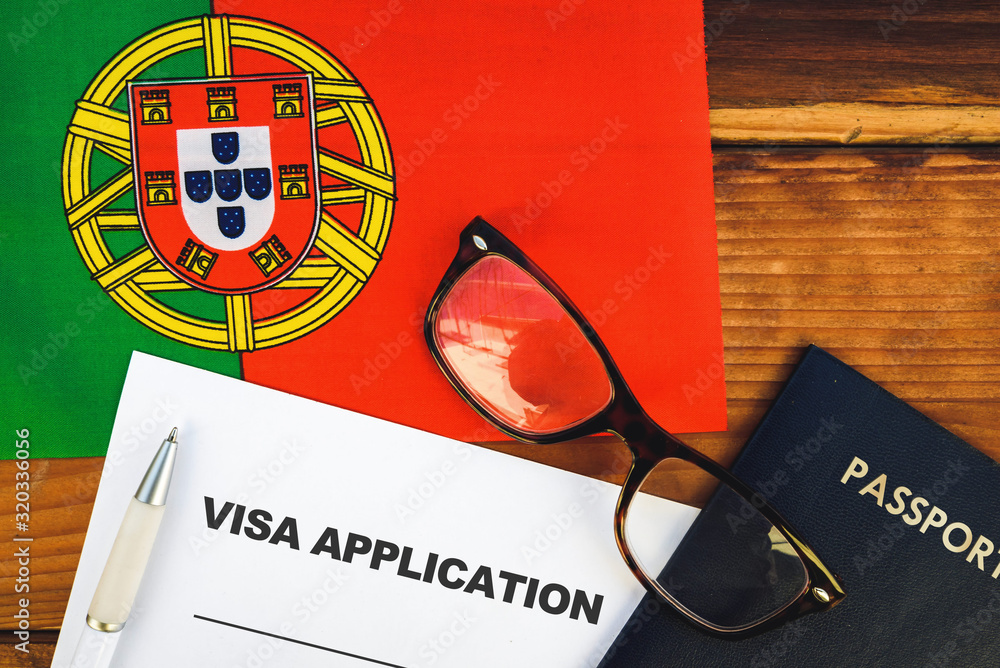 Flag of Portugal , visa application form and passport on table Stock ...