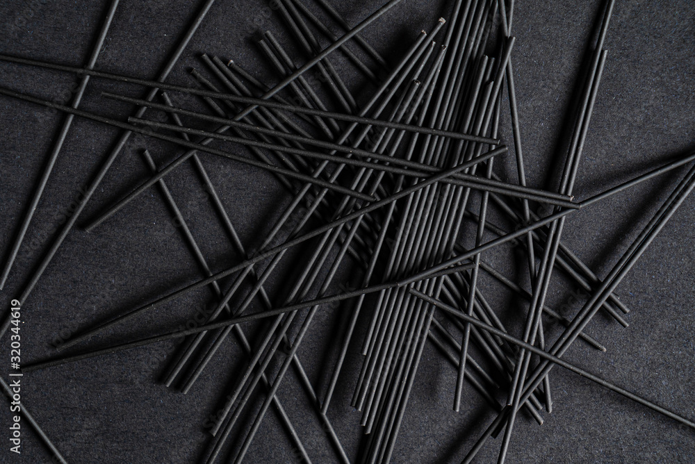 black background with black sticks Stock Photo | Adobe Stock