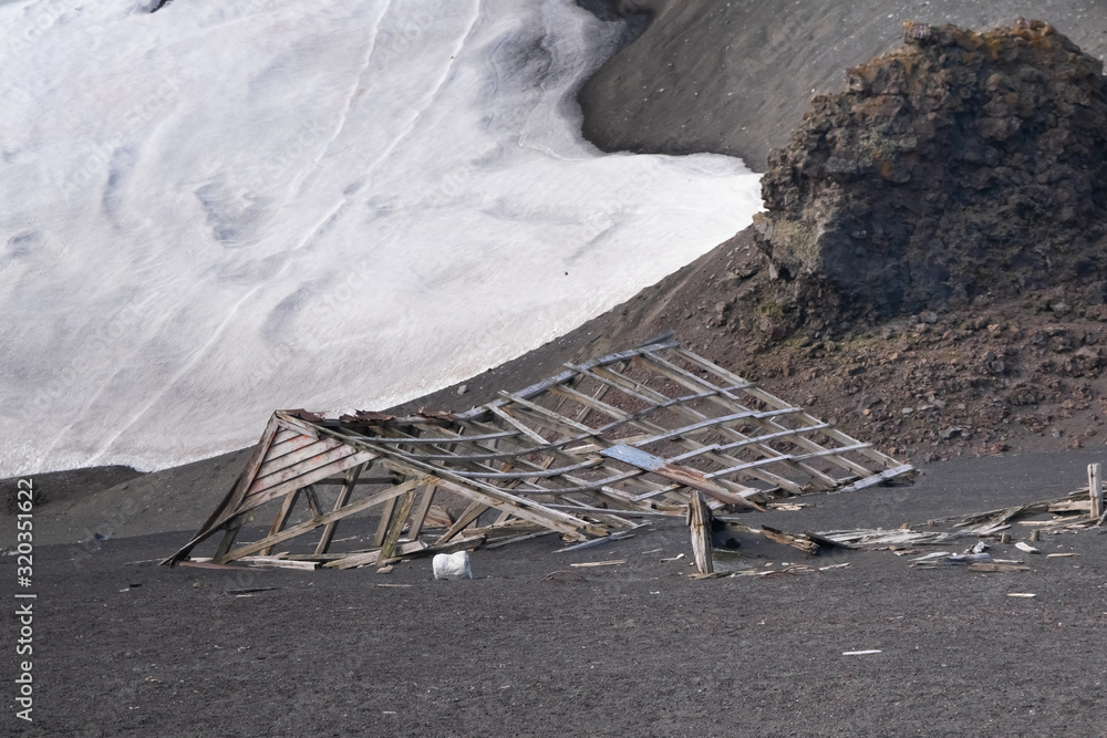 Ruined remains of a Chilean Base station burnt down by a volcano ...
