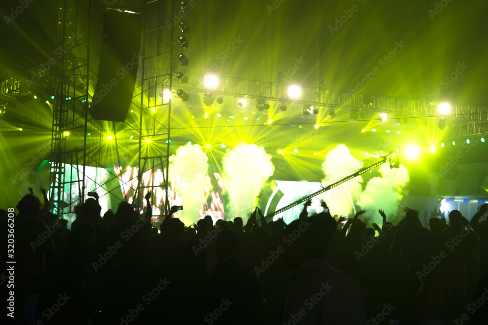Silhouette spectator crowd people standing at concert performance pop ...