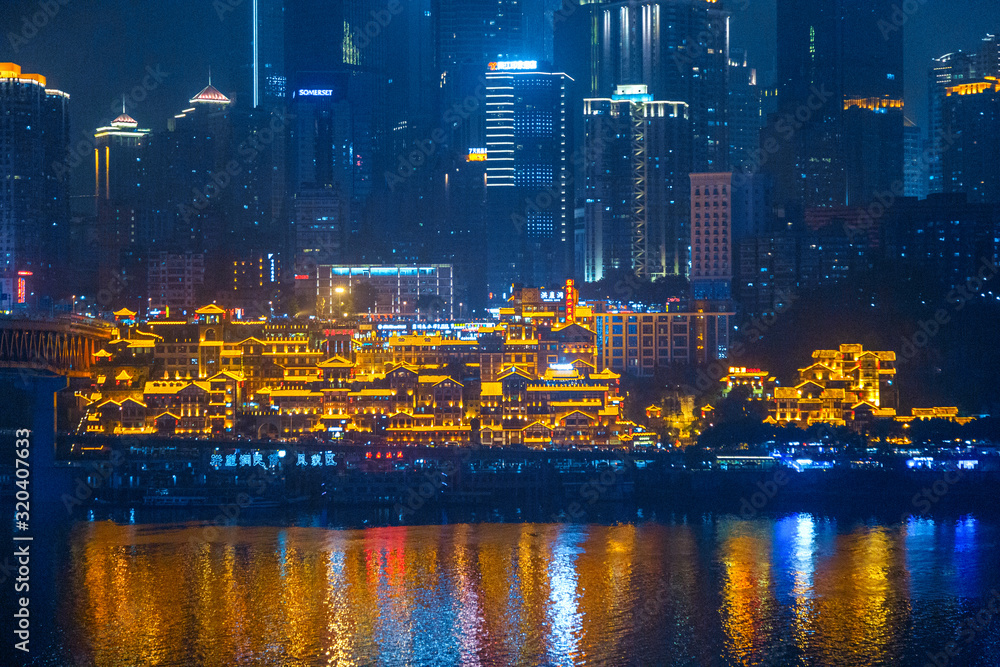 City night view of Chongqing, China. The scenery by the river. The ...