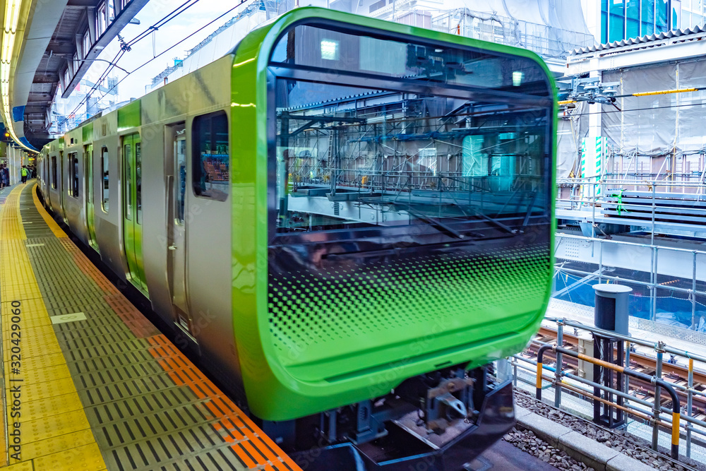 Japan. Modern train in Tokyo. Futuristic style train in Japan. Glass ...