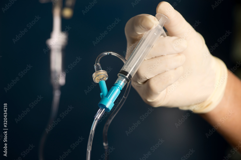 IV Medication Push By Syringe Stock Photo | Adobe Stock