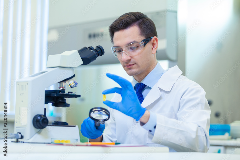 Scientist studies properties and benefits of omega 3 fatty acids using ...