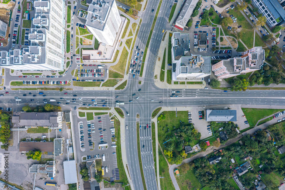overhead aerial birds eye view of residential district with crossroad ...