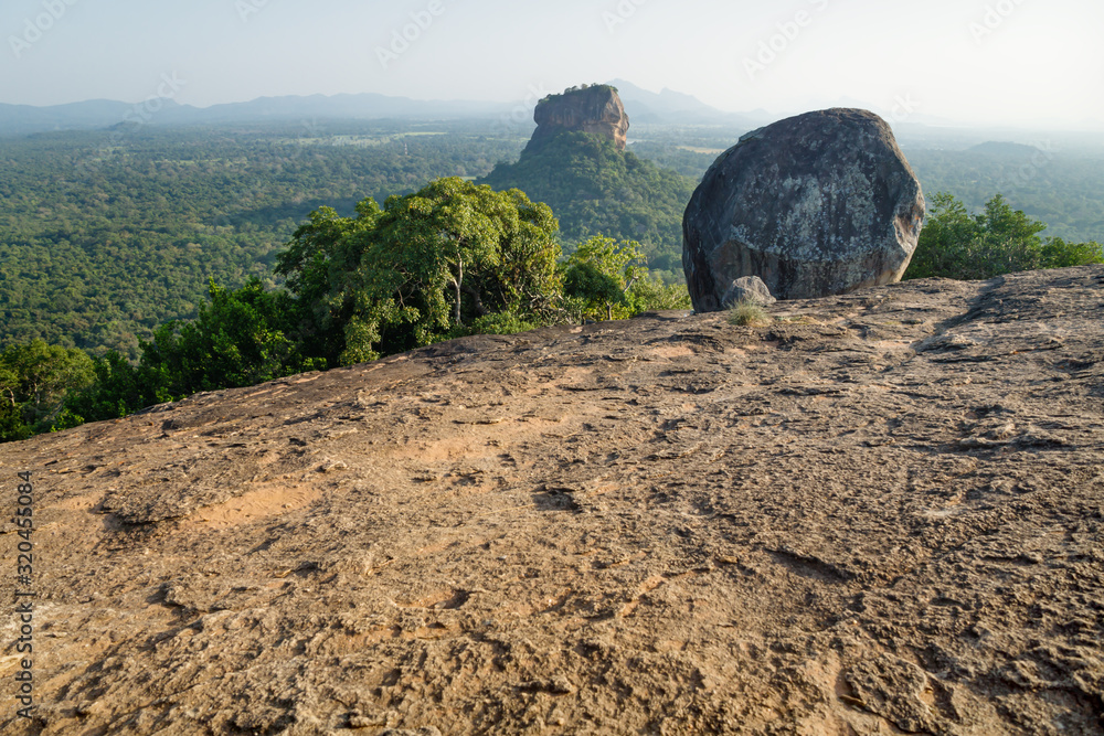 Big Stone on Pidurangala Rock with view on Lions Rock in Sigiriya, Sri ...