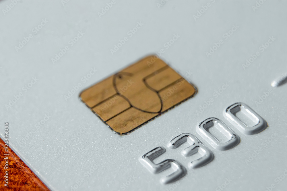 Micro credit card chip close-up, soft focus. New technologies, EMV chip ...