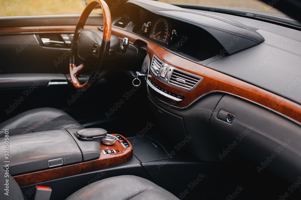 Luxury premium car interior with leather seats and modern technology ...