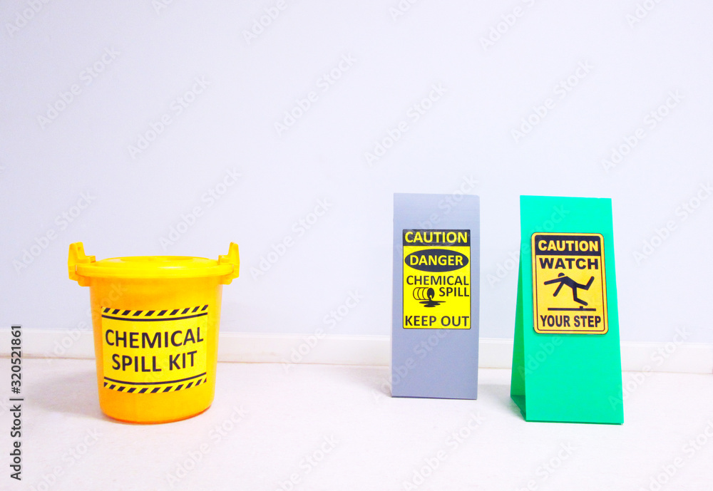 The Chemical Spill kit yellow bucket and Warning danger caution hazard ...