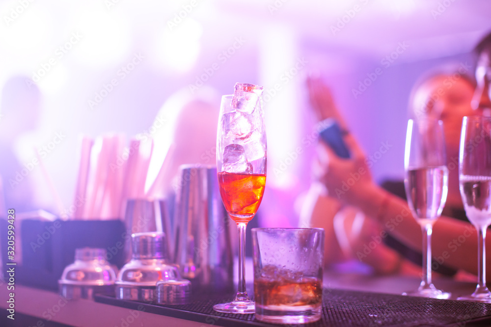 Alcohol drinks nad cocktails at counter in night club Stock Photo ...
