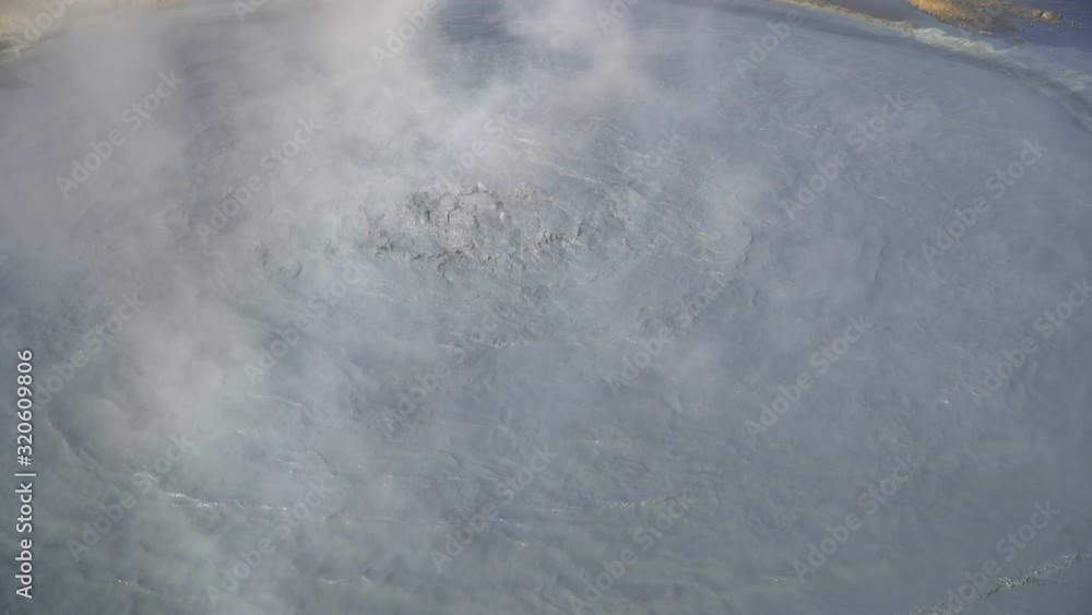 Hverir Myvatn geothermal area with natural steam vents and mud pools ...