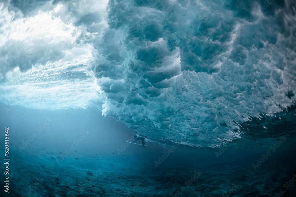 Underwater view of the surfer passing the ocean wave Stock Photo ...