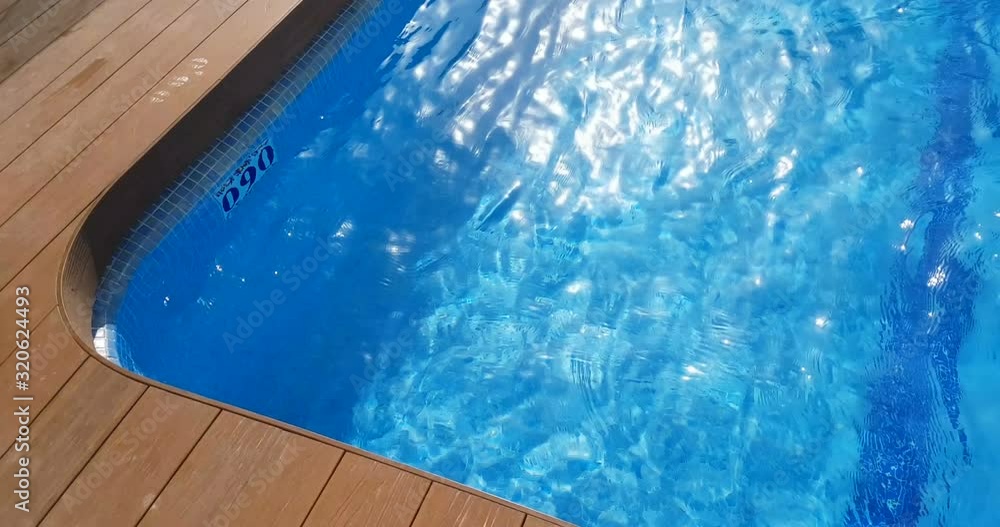 swimming pool surface caustics ripple like sea water and flow with ...