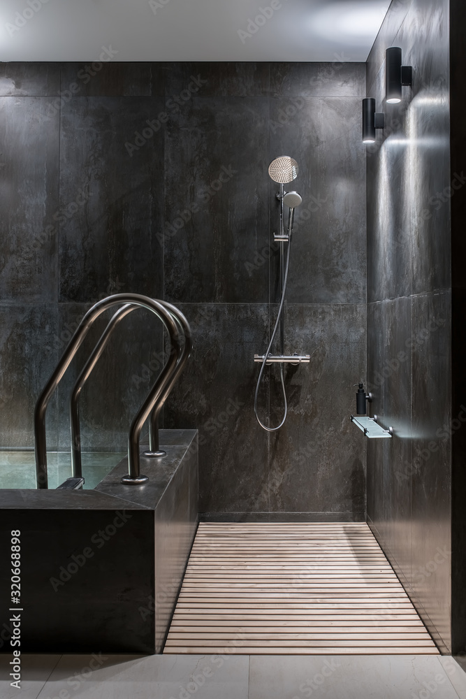 Trendy modern spa interior with tiled walls Stock Photo | Adobe Stock