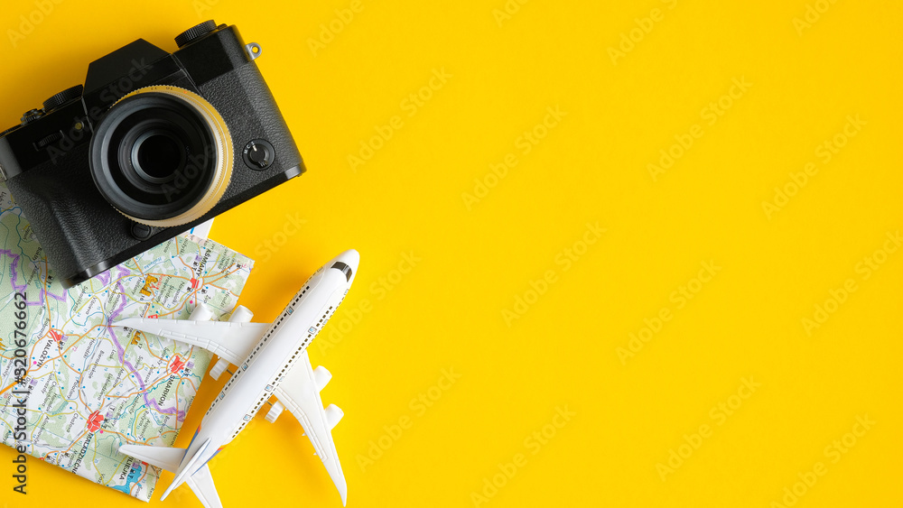 Travel planning concept. Flat lay traveler accessories on yellow ...