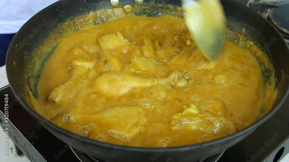 Boil Kari curry in pot, Indian food Stock Video | Adobe Stock