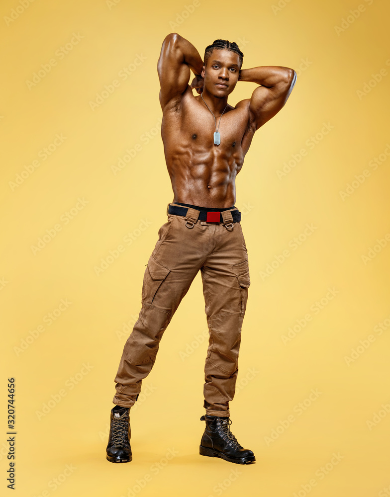 Muscular man shirtless. Photo of handsome man with perfect body after ...