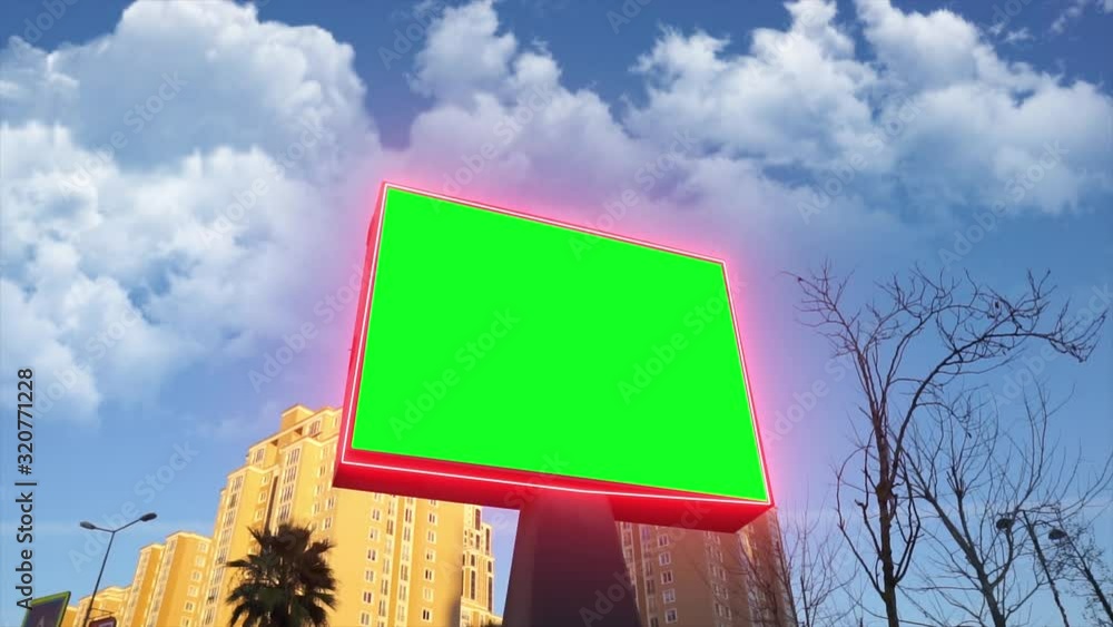 Green screen billboard on urban, city life. Blank advertisement panel ...