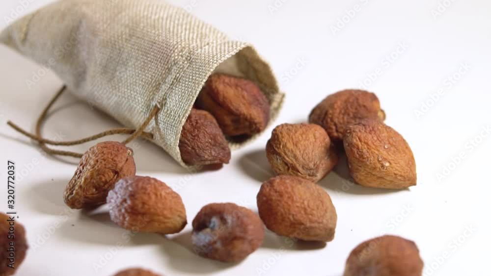 Dried plum white isolated background. Food fruits and nuts, dates for ...