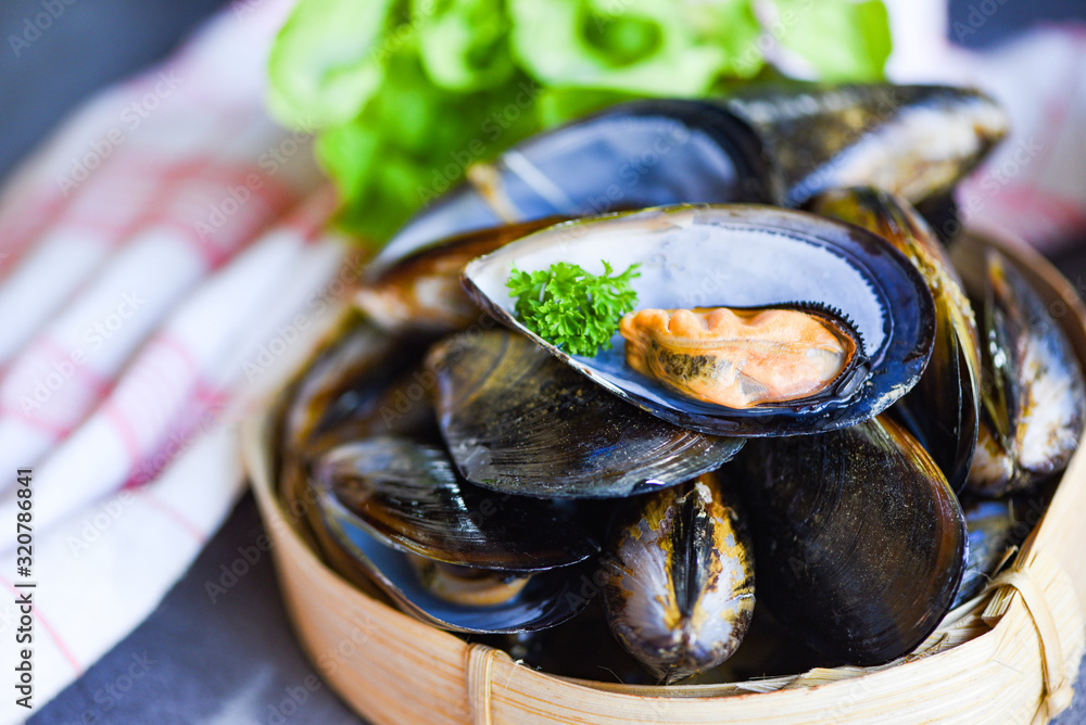 Mussels with herbs lemon on cook steamer food background - Fresh ...