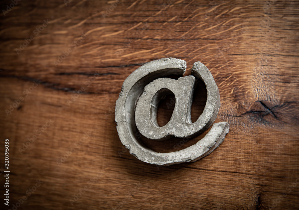 Broken @ Sign made of Cement Stock Photo | Adobe Stock