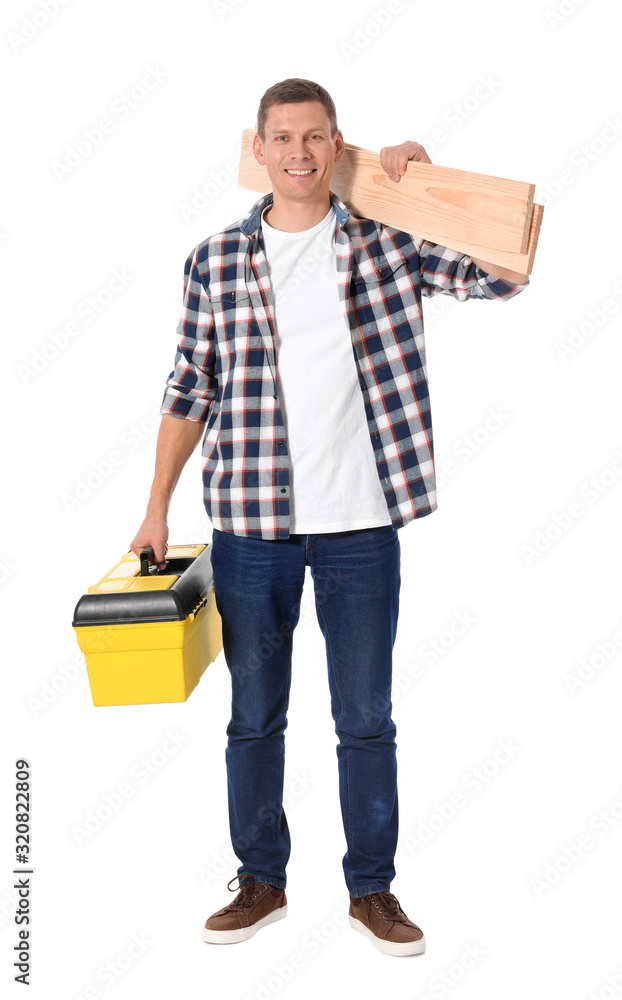 Handsome carpenter with wooden planks and tool box isolated on white ...